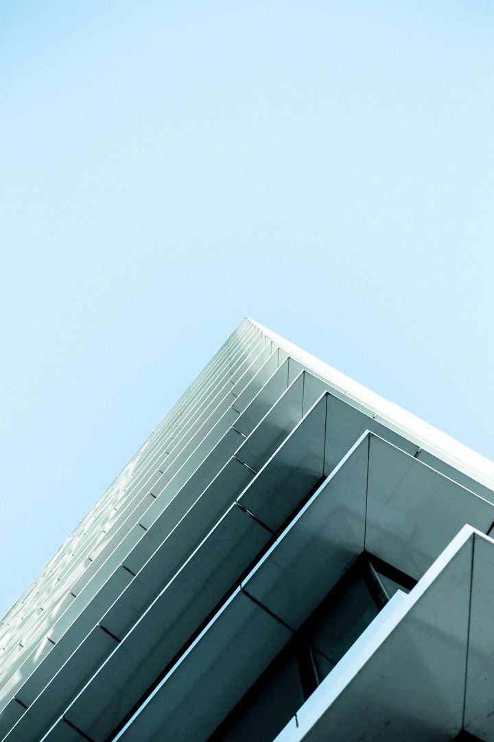 Modern Architectural Building with Angular Design and Clear Sky