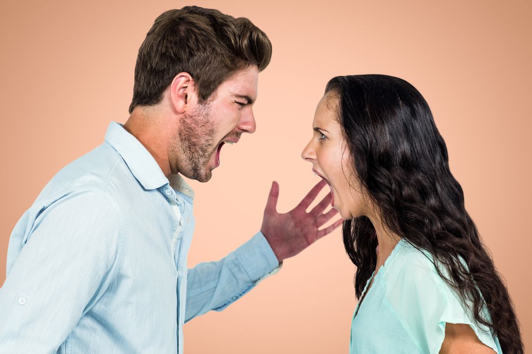 Couple arguing intensely against plain background - Free Stock Photo ...
