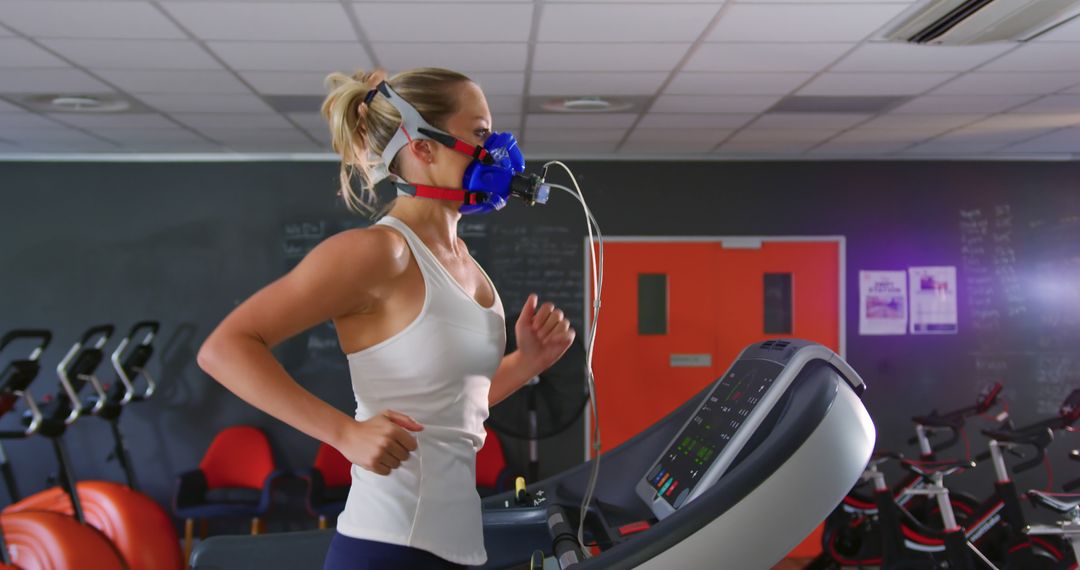 Woman Conducting VO2 Max Test on Treadmill at Modern Gym