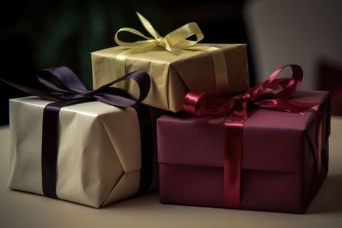 Close up of stack of gifts with ribbon, created using generative ai ...